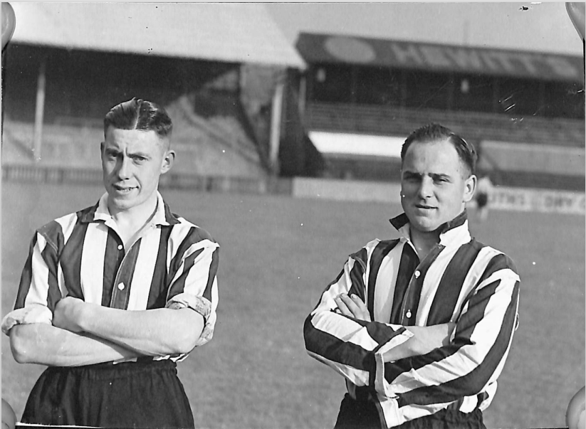 Two town players in their town kits at Blundell Park - GTFC Heritage